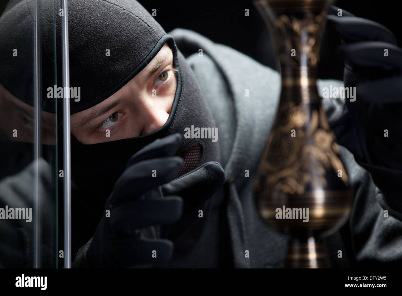 burglar wearing black mask Stock Photo - Alamy