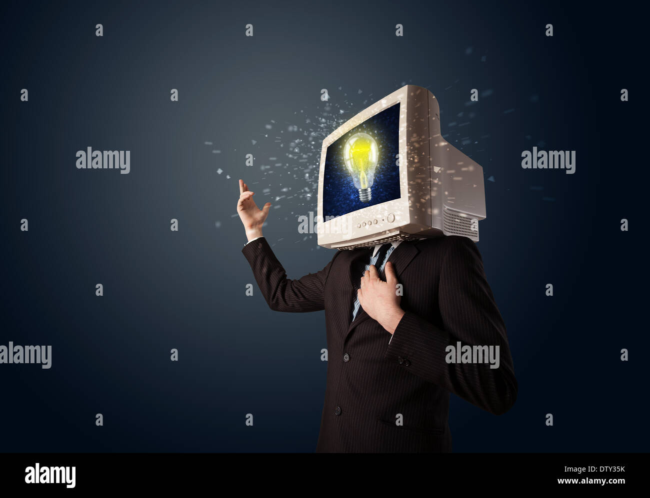 Business man with a pc monitor head and idea light bulb in the display ...
