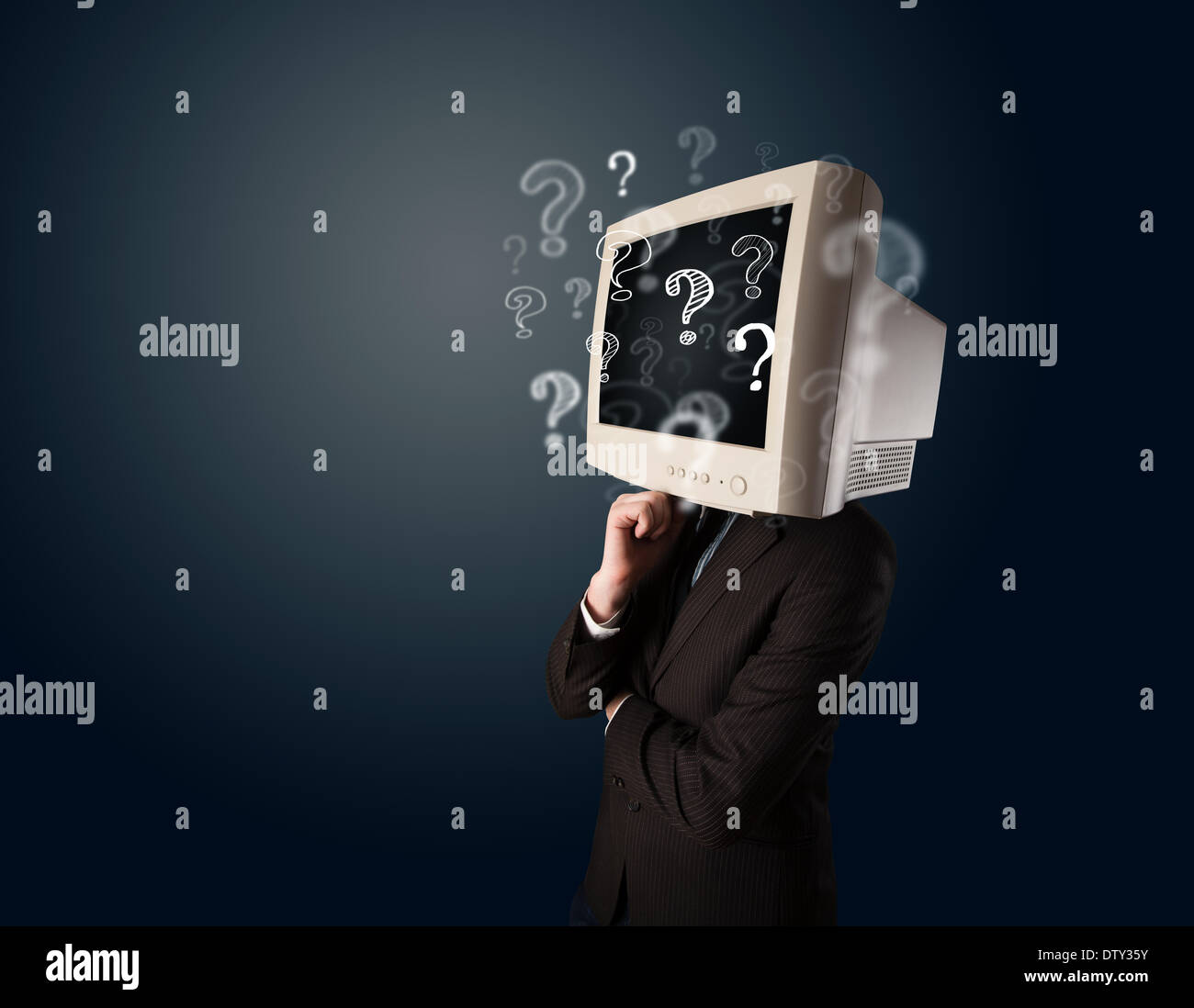 Businessman with a computer monitor head and question marks Stock Photo ...
