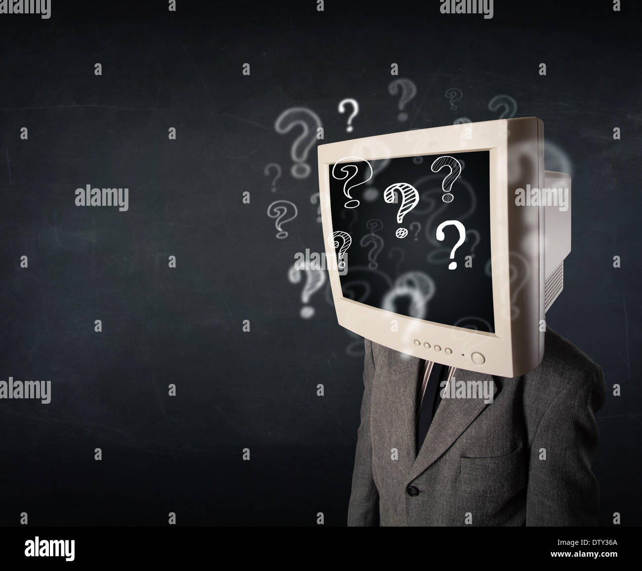 Businessman with a computer monitor head and question marks Stock Photo ...
