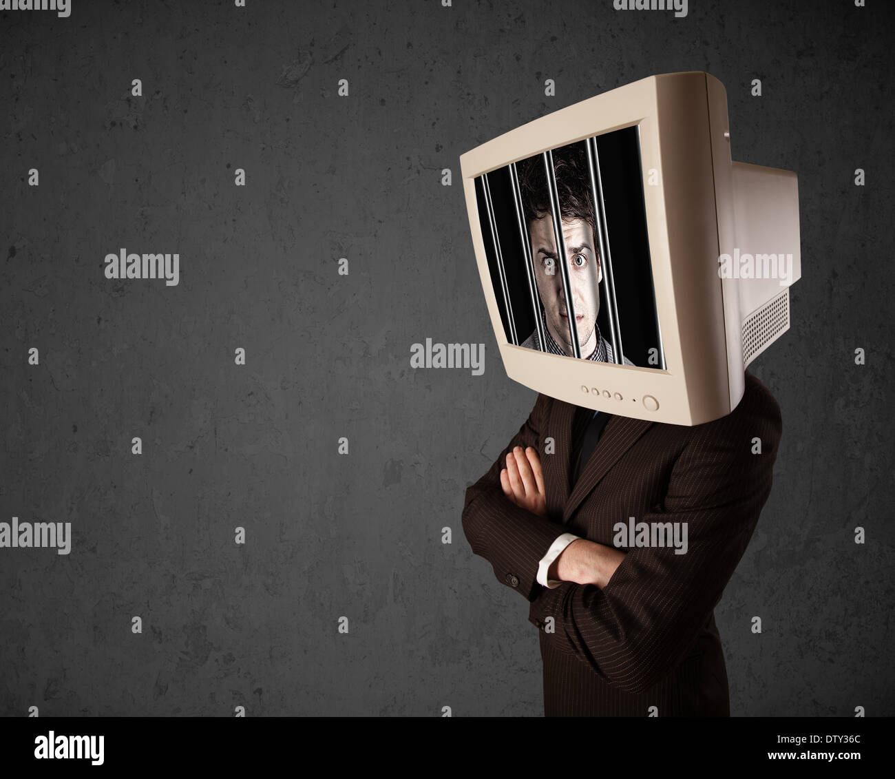 Business man with monitor on his head traped into a digital system ...