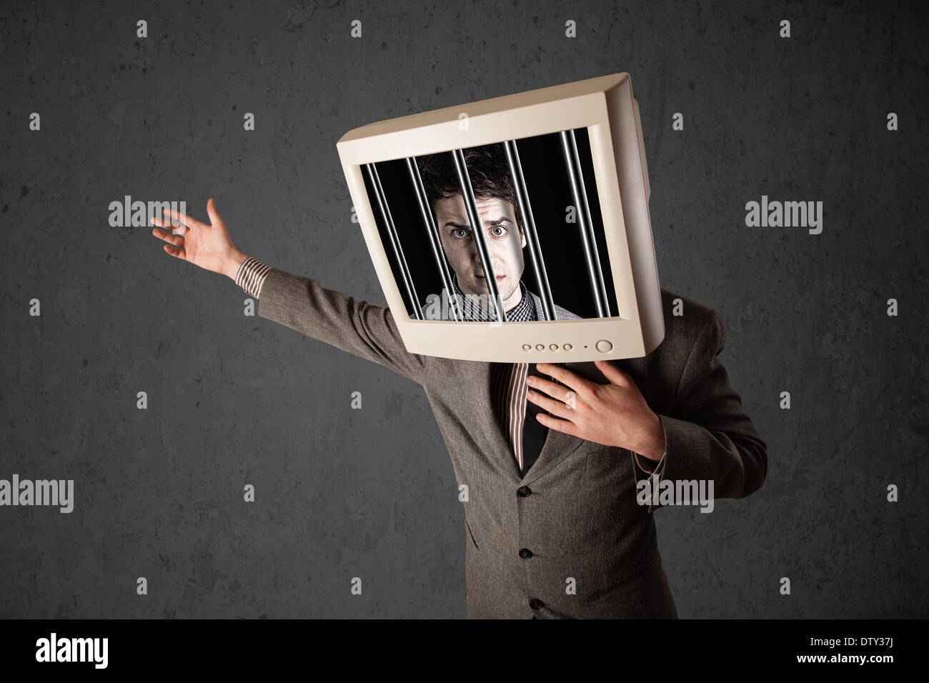 Business man with monitor on his head traped into a digital system ...