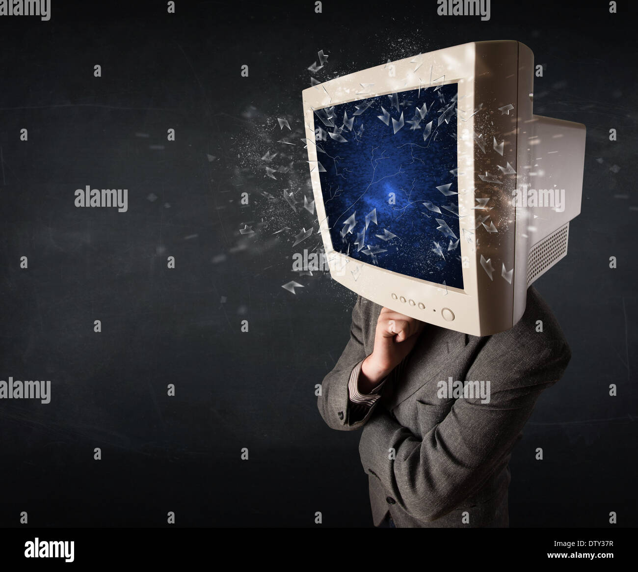 Computer monitor screen exploding on a young persons head Stock Photo - Alamy