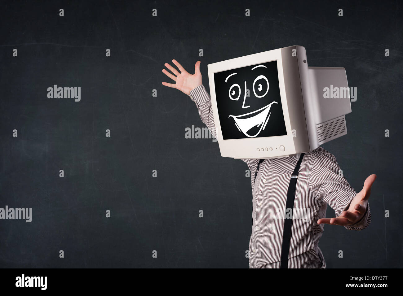 Happy businessman with a PC monitor head and a smiley face Stock Photo ...