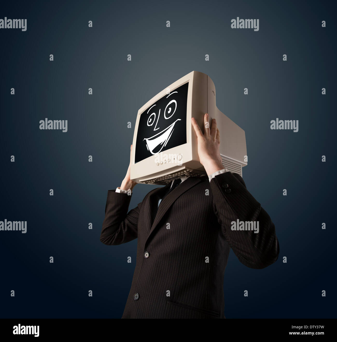 Happy businessman with a PC monitor head and a smiley face Stock Photo ...