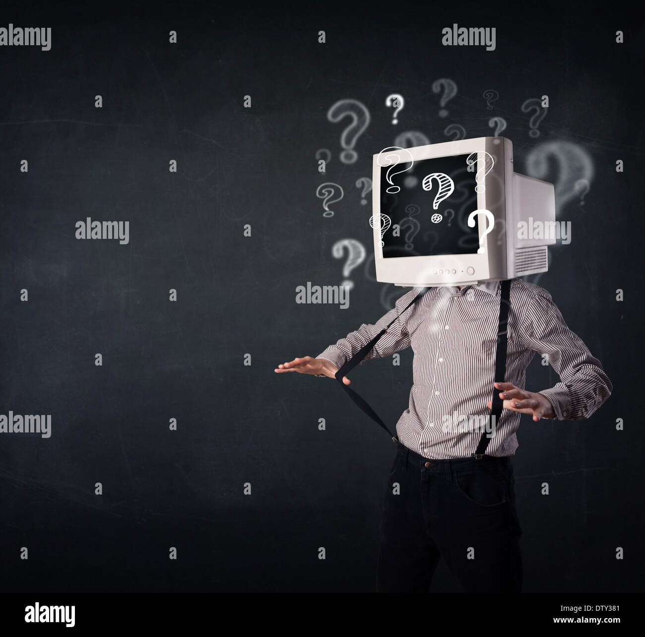 Businessman with a computer monitor head and question marks Stock Photo ...