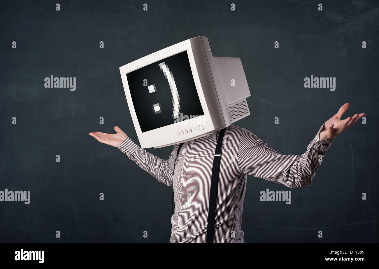 Funny young businessman with a monitor on his head and smiley on the ...