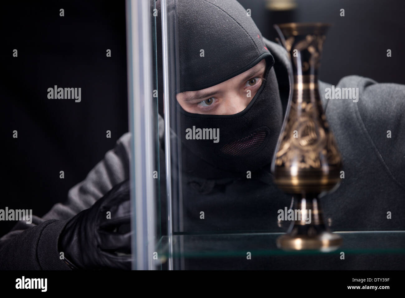 Gangster wearing mask hi-res stock photography and images - Alamy