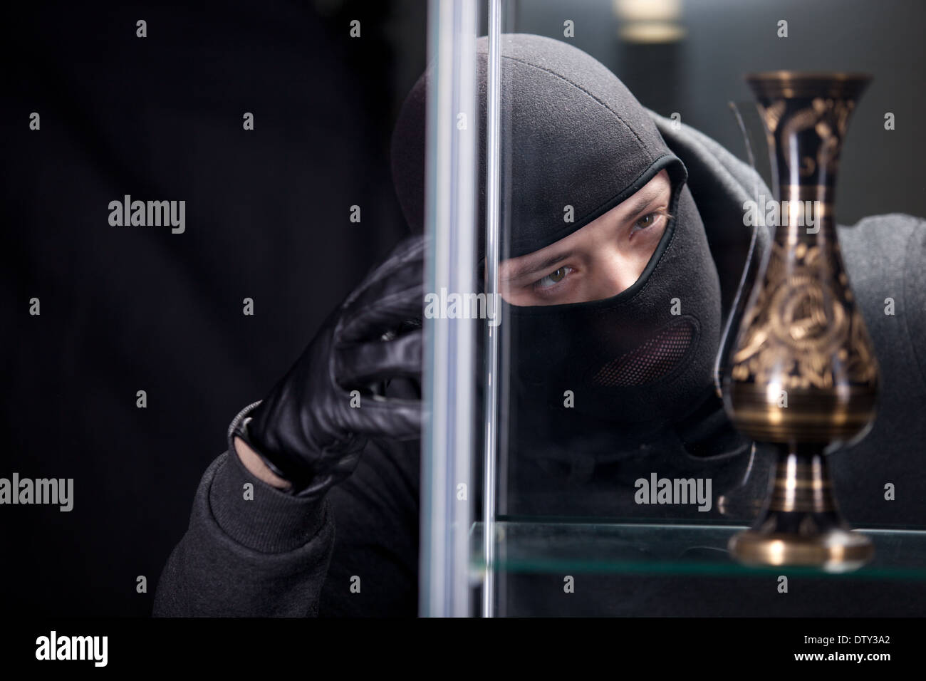burglar wearing black mask Stock Photo - Alamy
