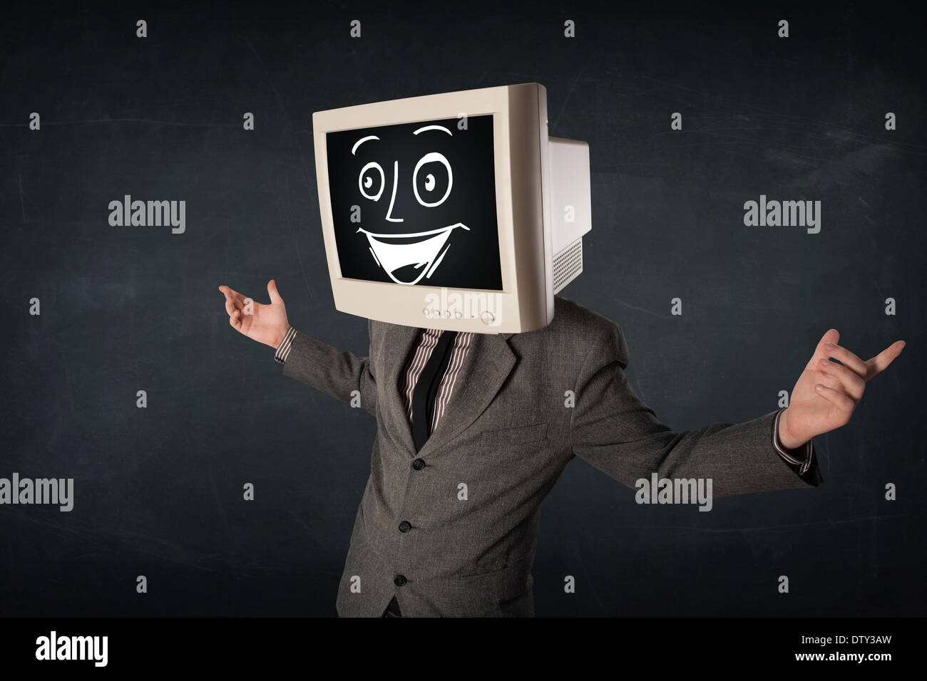 Happy businessman with a PC monitor head and a smiley face Stock Photo ...