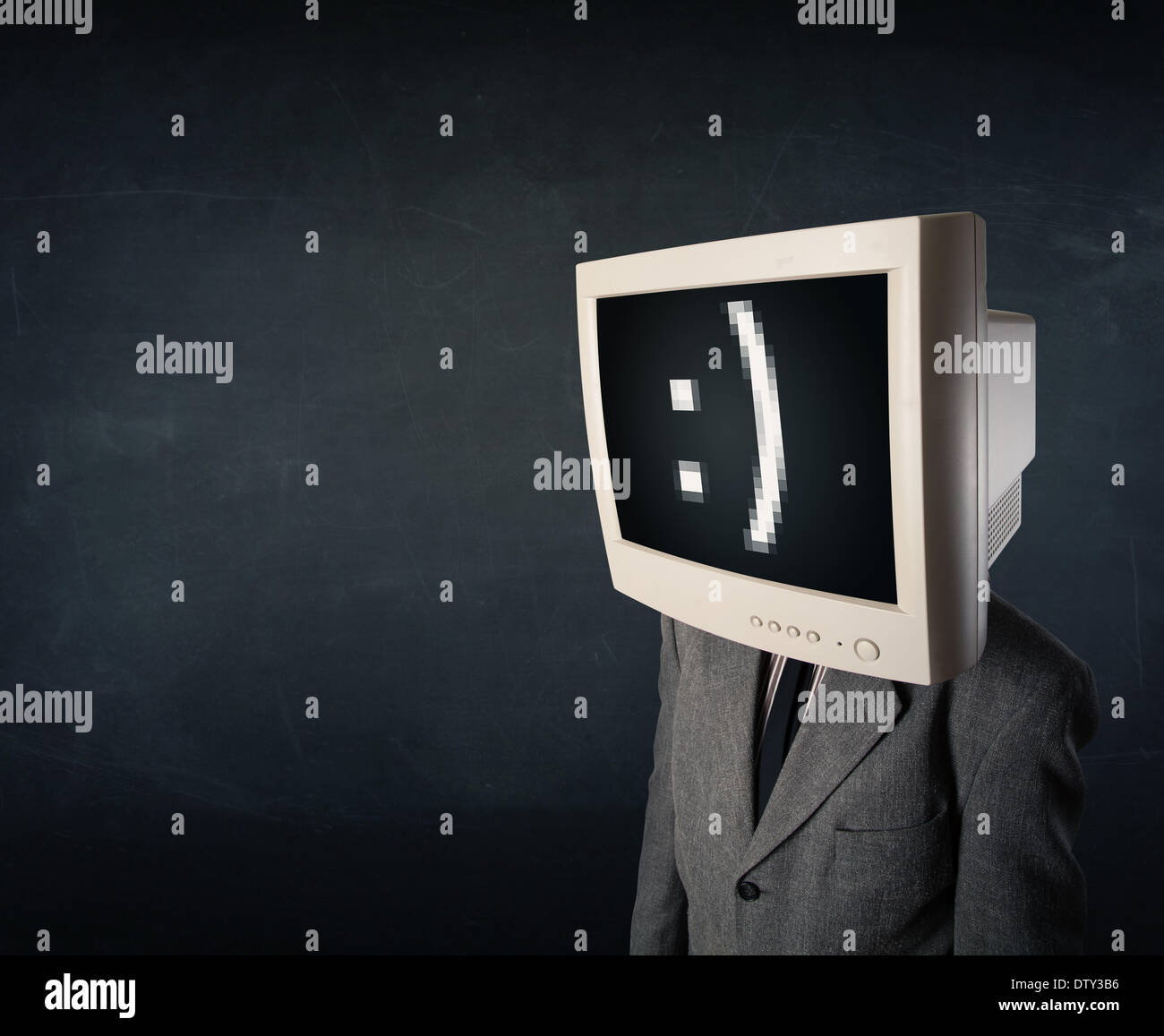 Funny young businessman with a monitor on his head and smiley on the ...