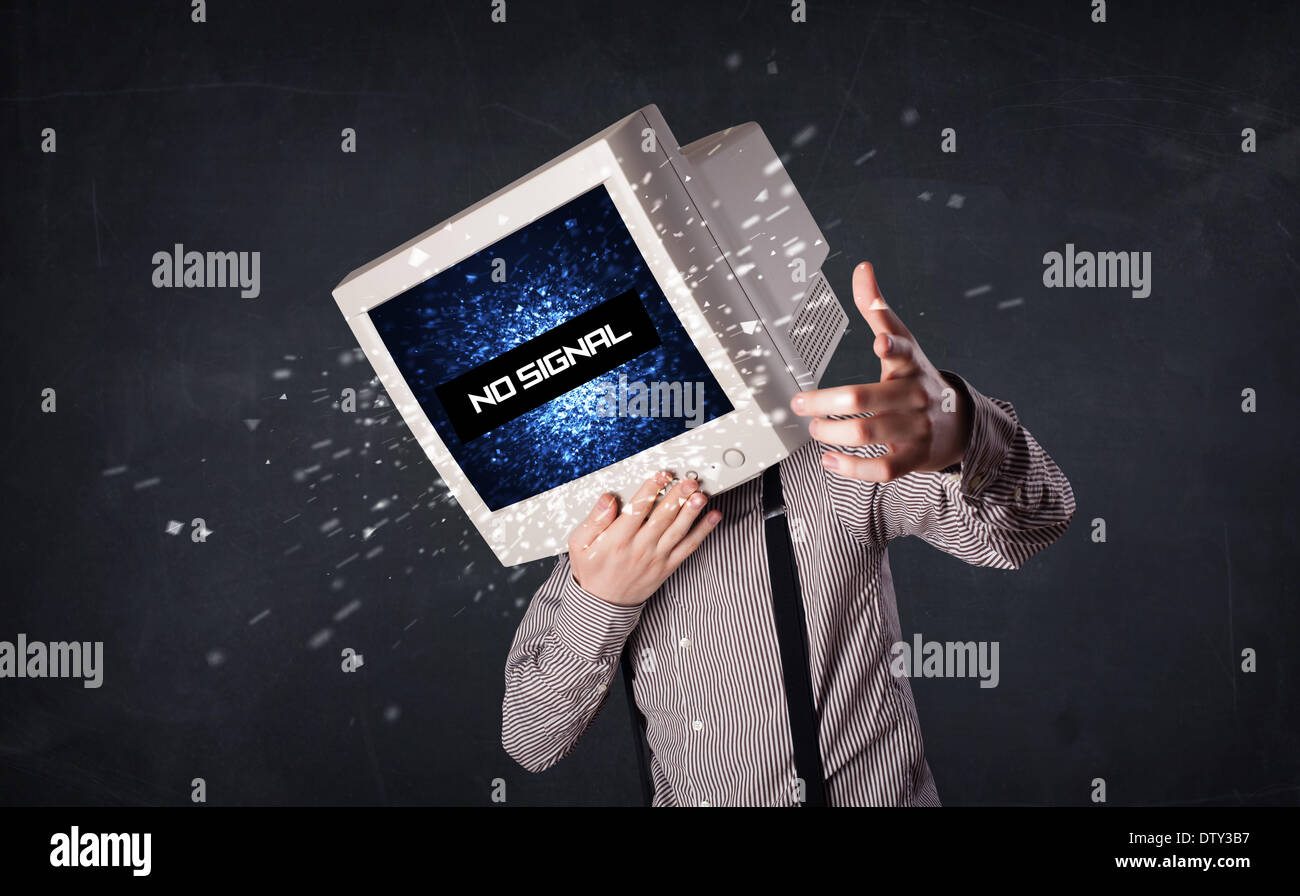 Man with a monitor head, no signal sign on the display Stock Photo - Alamy