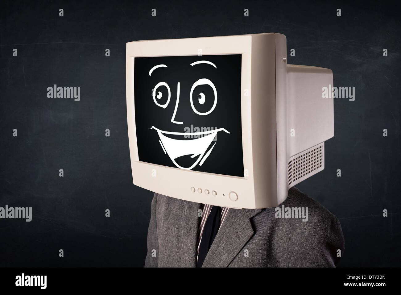 Happy businessman with a PC monitor head and a smiley face Stock Photo ...