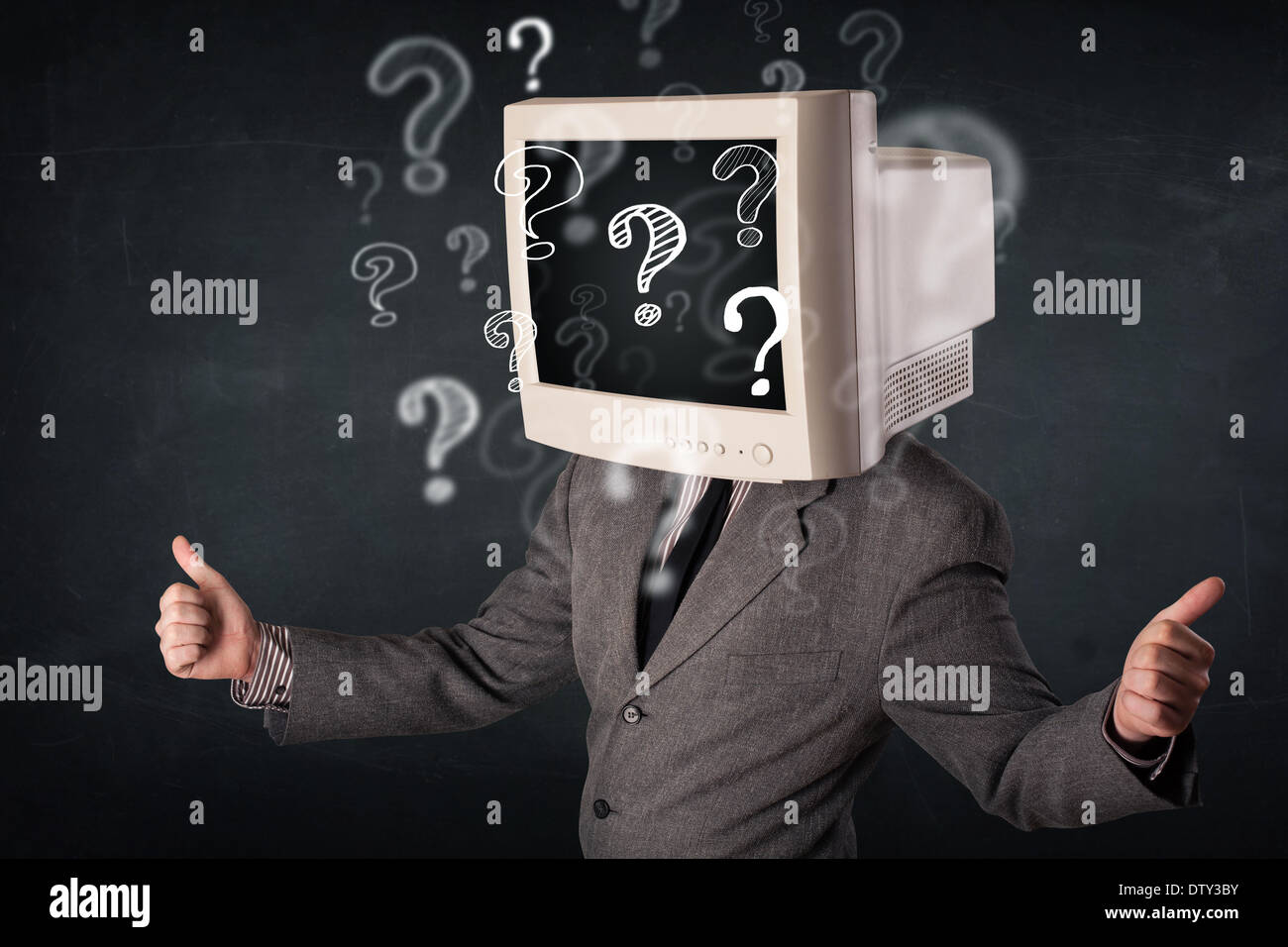 Businessman with a computer monitor head and question marks Stock Photo ...