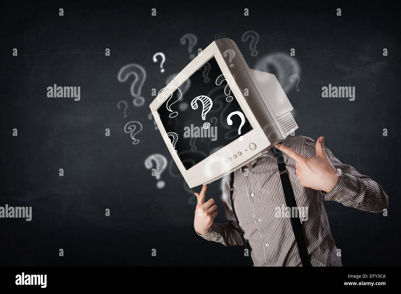 Businessman with a computer monitor head and question marks Stock Photo ...