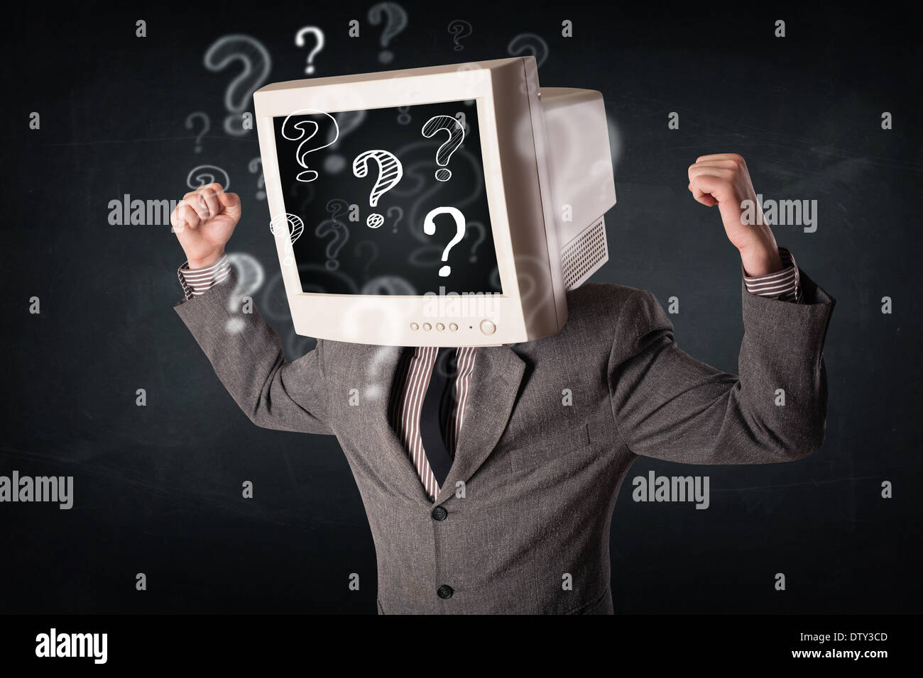 Businessman with a computer monitor head and question marks Stock Photo ...