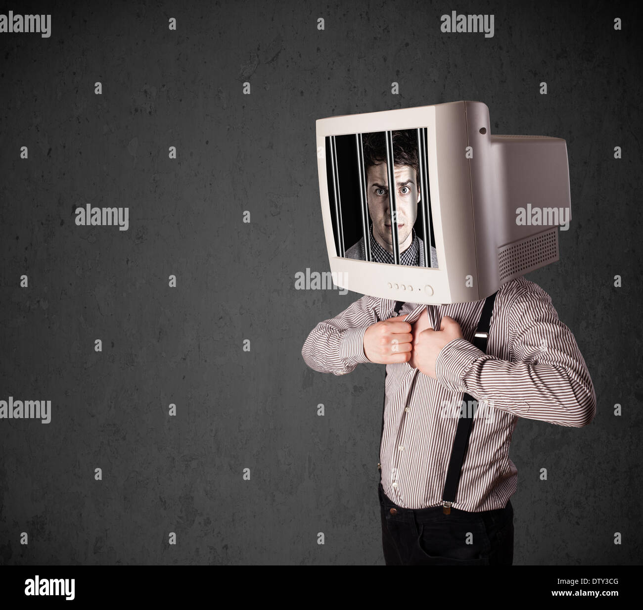 Business man with monitor on his head traped into a digital system ...