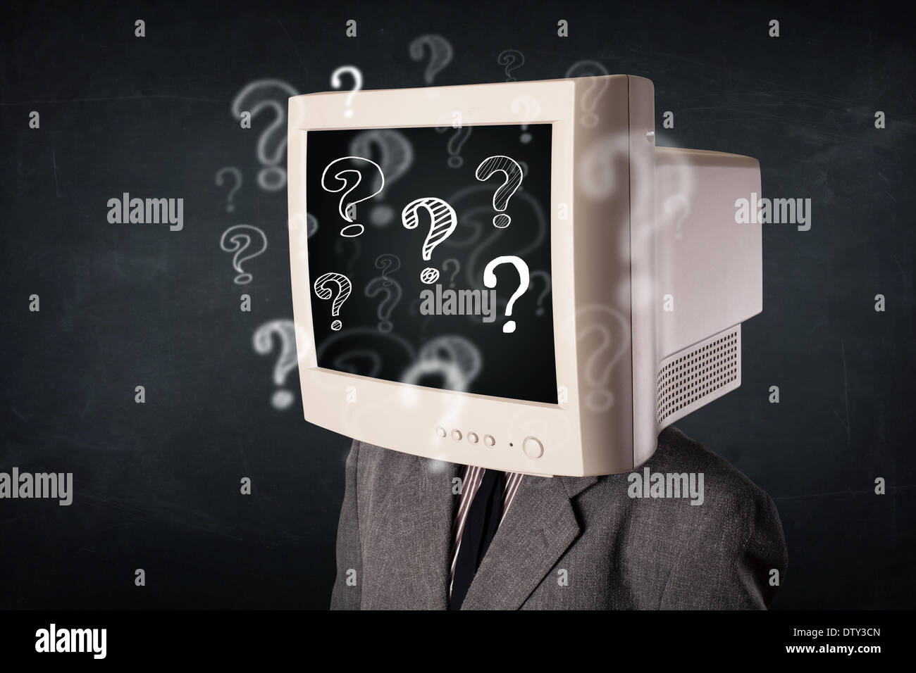 Businessman with a computer monitor head and question marks Stock Photo ...