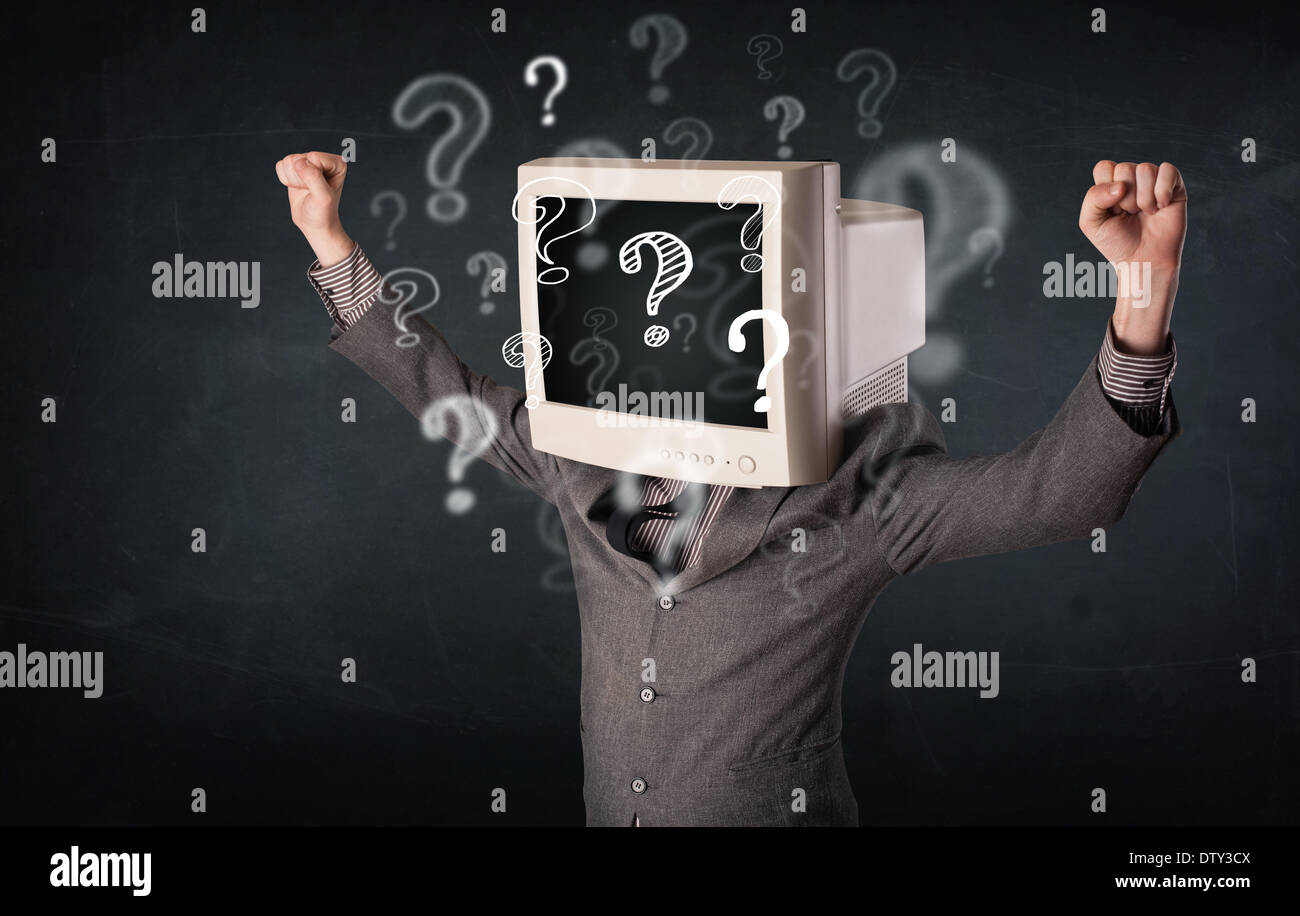 Businessman with a computer monitor head and question marks Stock Photo ...