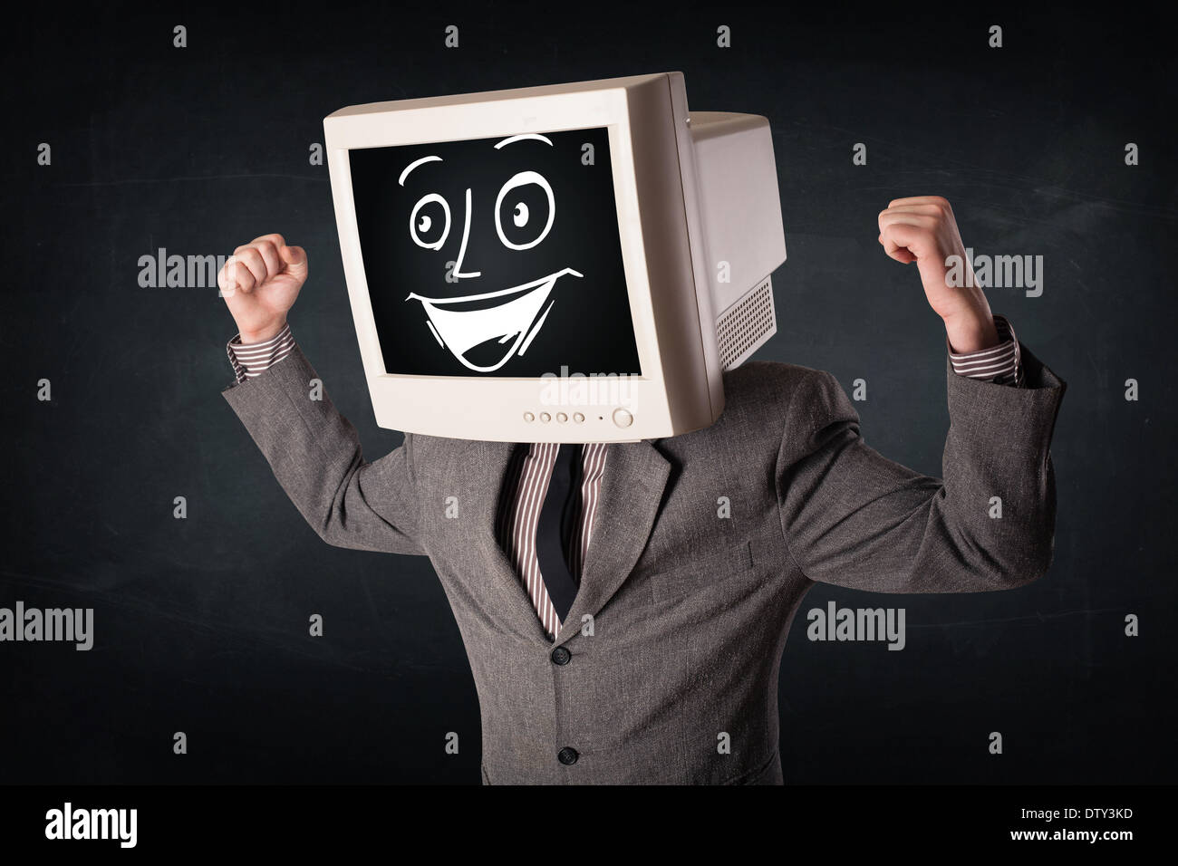 Happy businessman with a PC monitor head and a smiley face Stock Photo ...