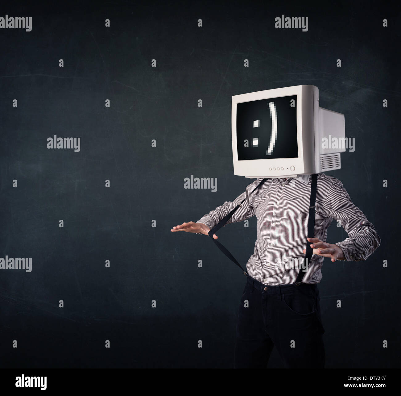 Funny young businessman with a monitor on his head and smiley on the ...
