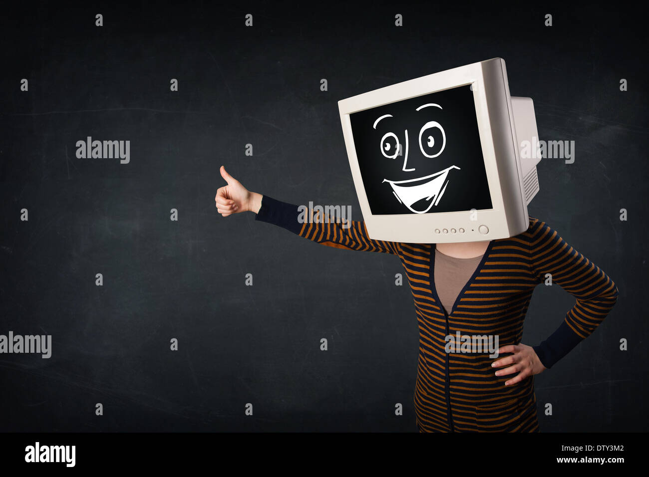 Girl with a monitor head and a cheerful cartoon face Stock Photo - Alamy