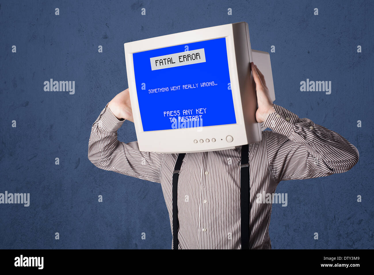 Person with a monitor head and fatal error blue screen on the display ...