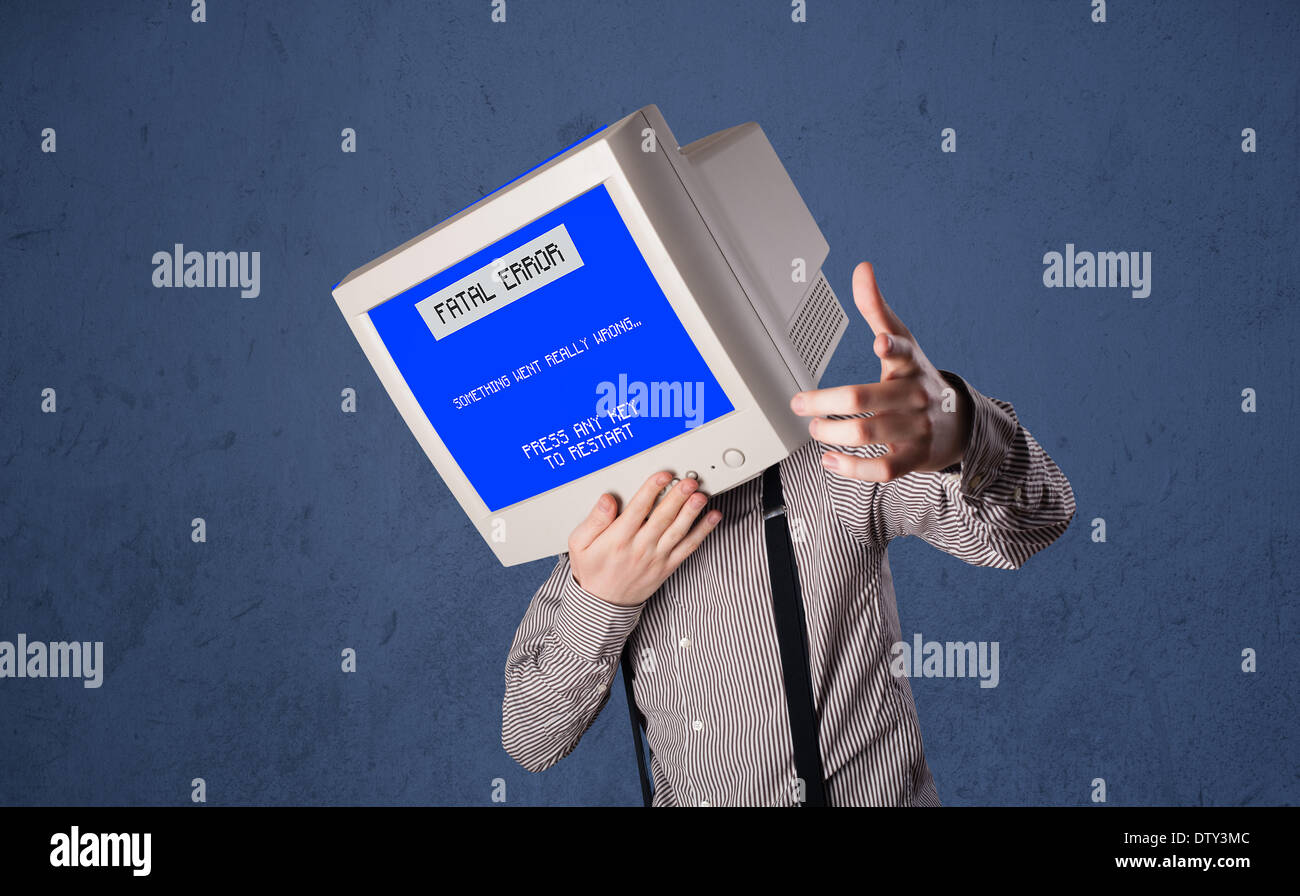 Person with a monitor head and fatal error blue screen on the display ...