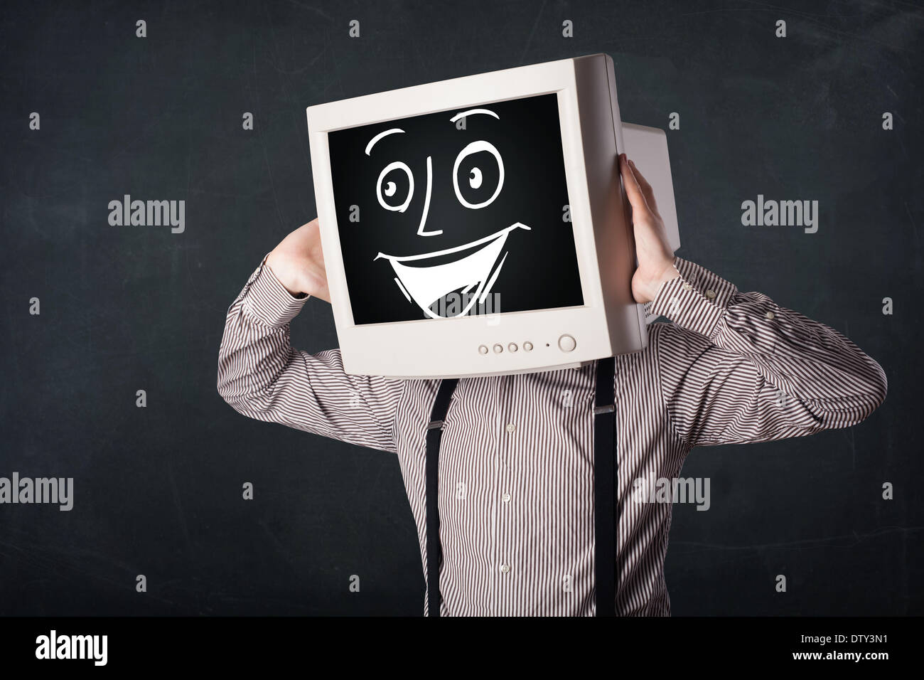Happy businessman with a PC monitor head and a smiley face Stock Photo ...
