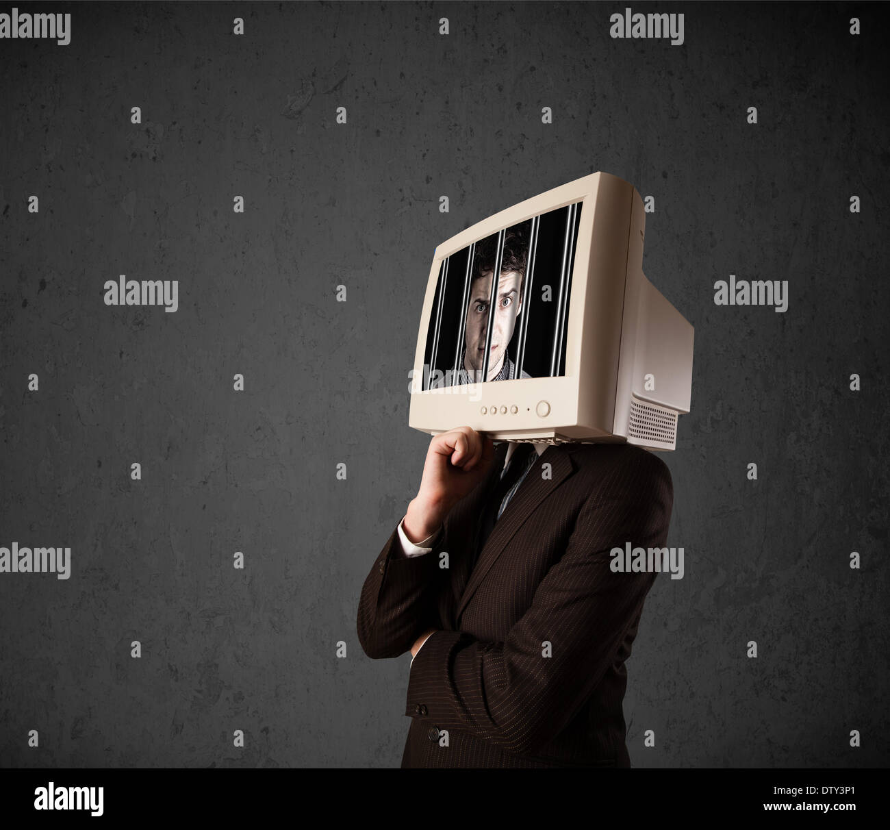 Business man with monitor on his head traped into a digital system ...