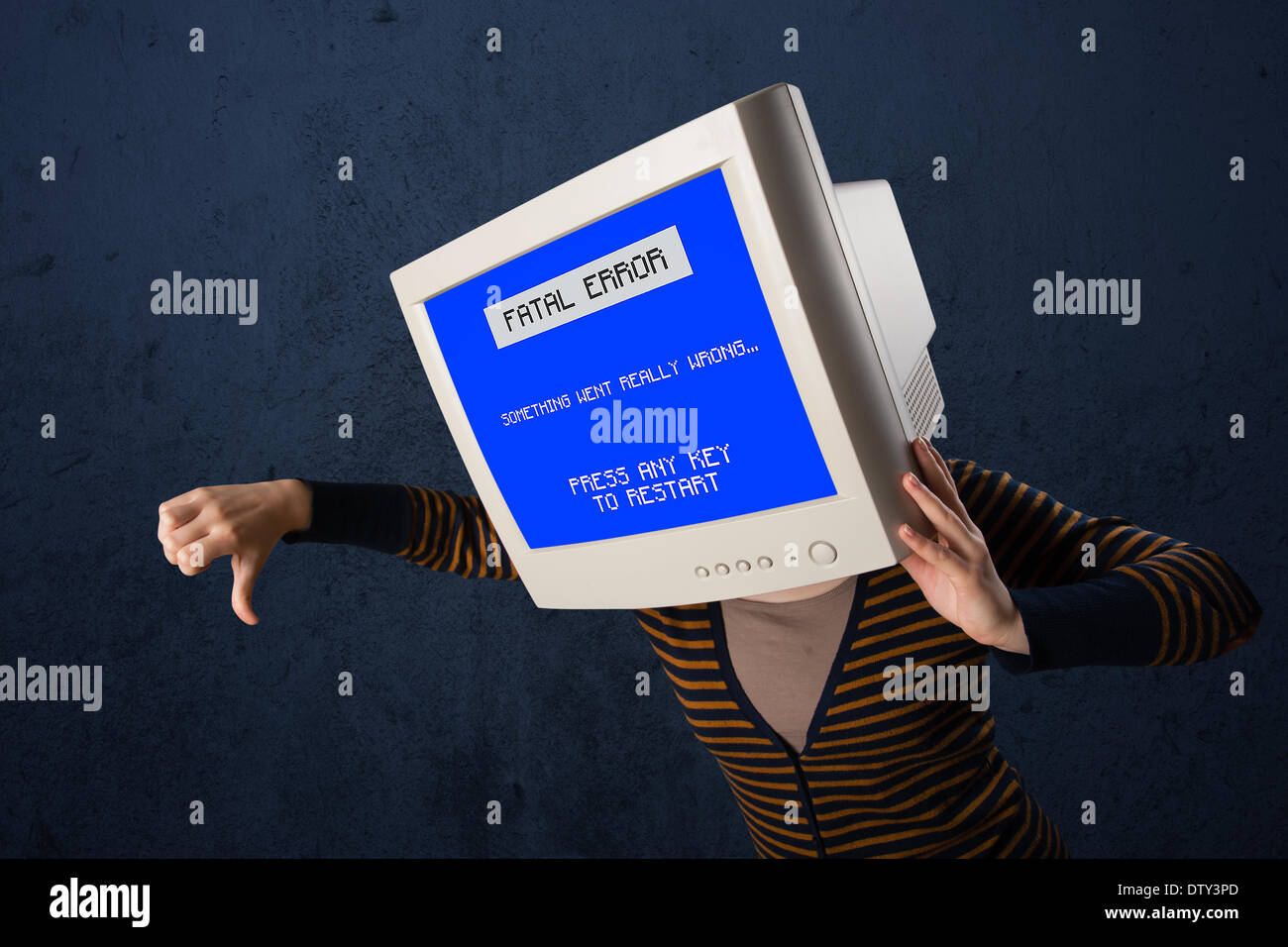 Person with a monitor head and fatal error blue screen on the display ...