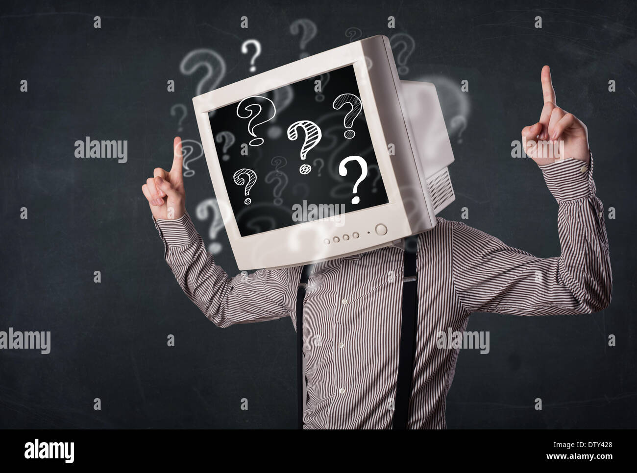 Businessman with a computer monitor head and question marks Stock Photo ...