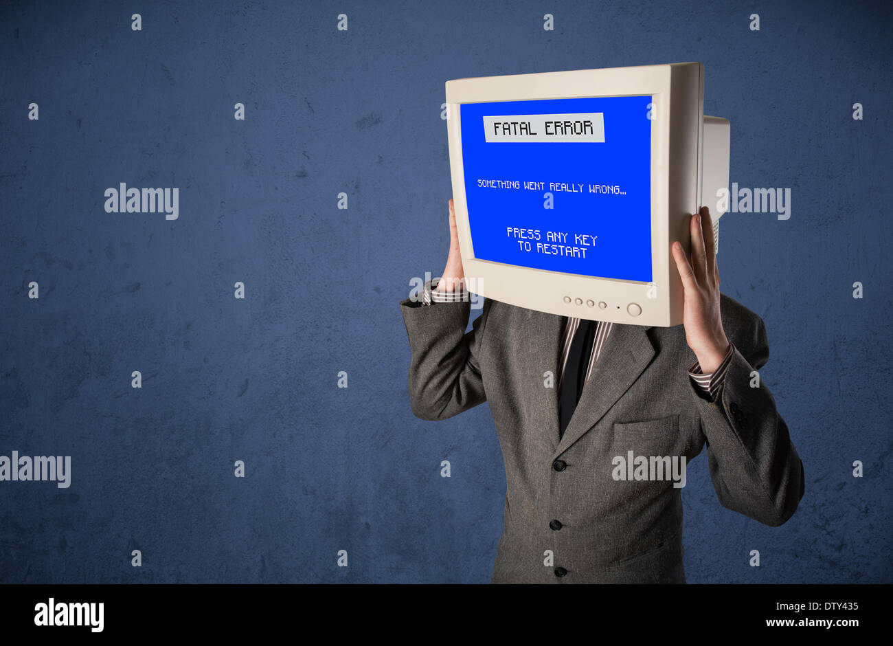Person with a monitor head and fatal error blue screen on the display ...
