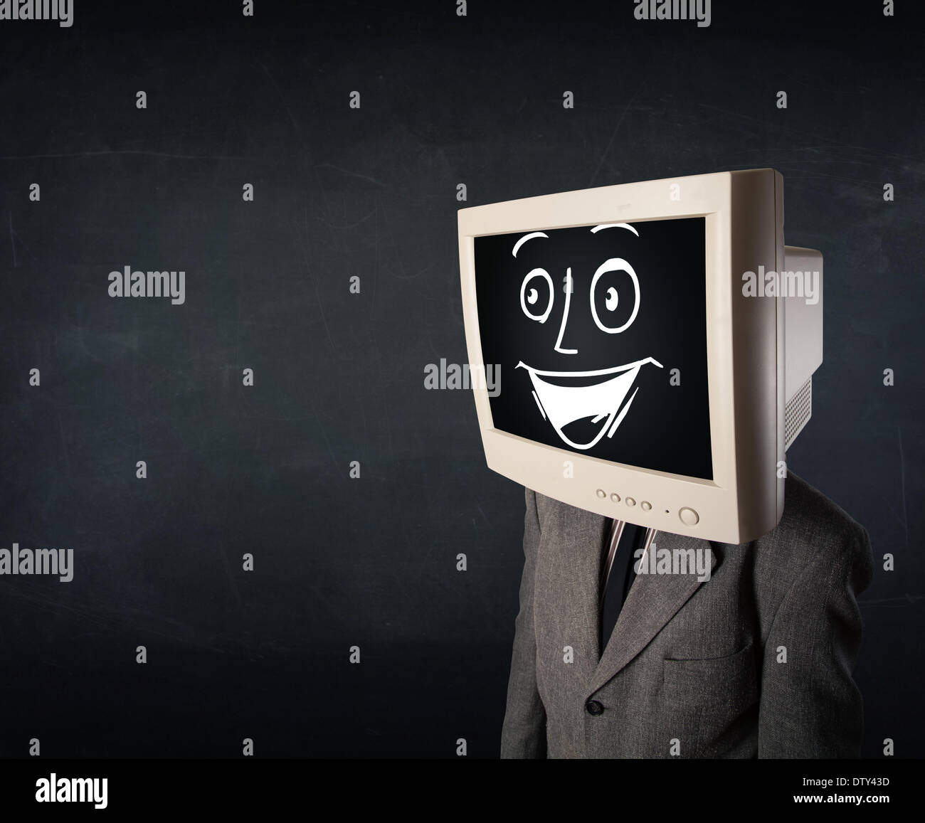 Happy businessman with a PC monitor head and a smiley face Stock Photo ...
