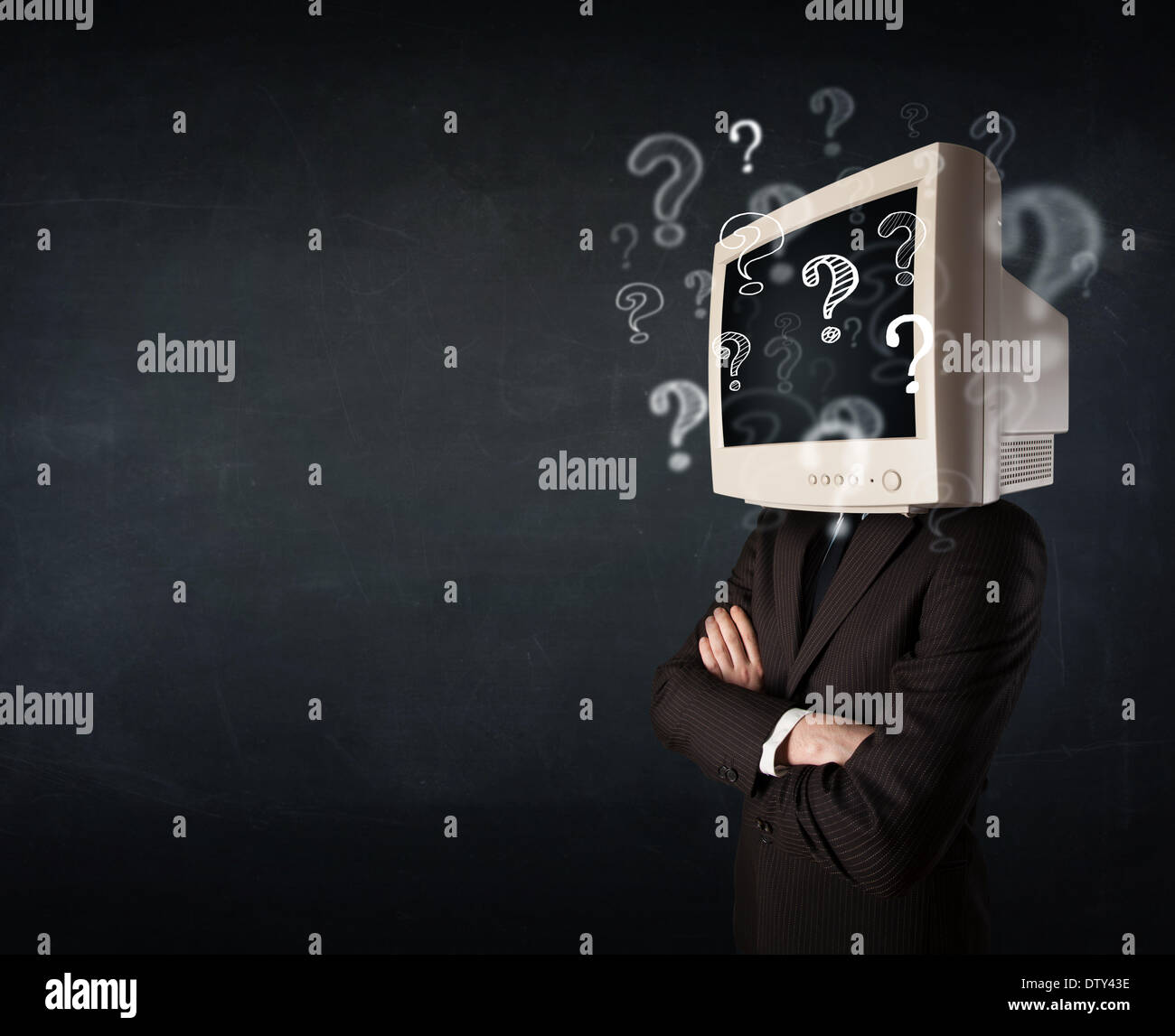 Businessman with a computer monitor head and question marks Stock Photo ...