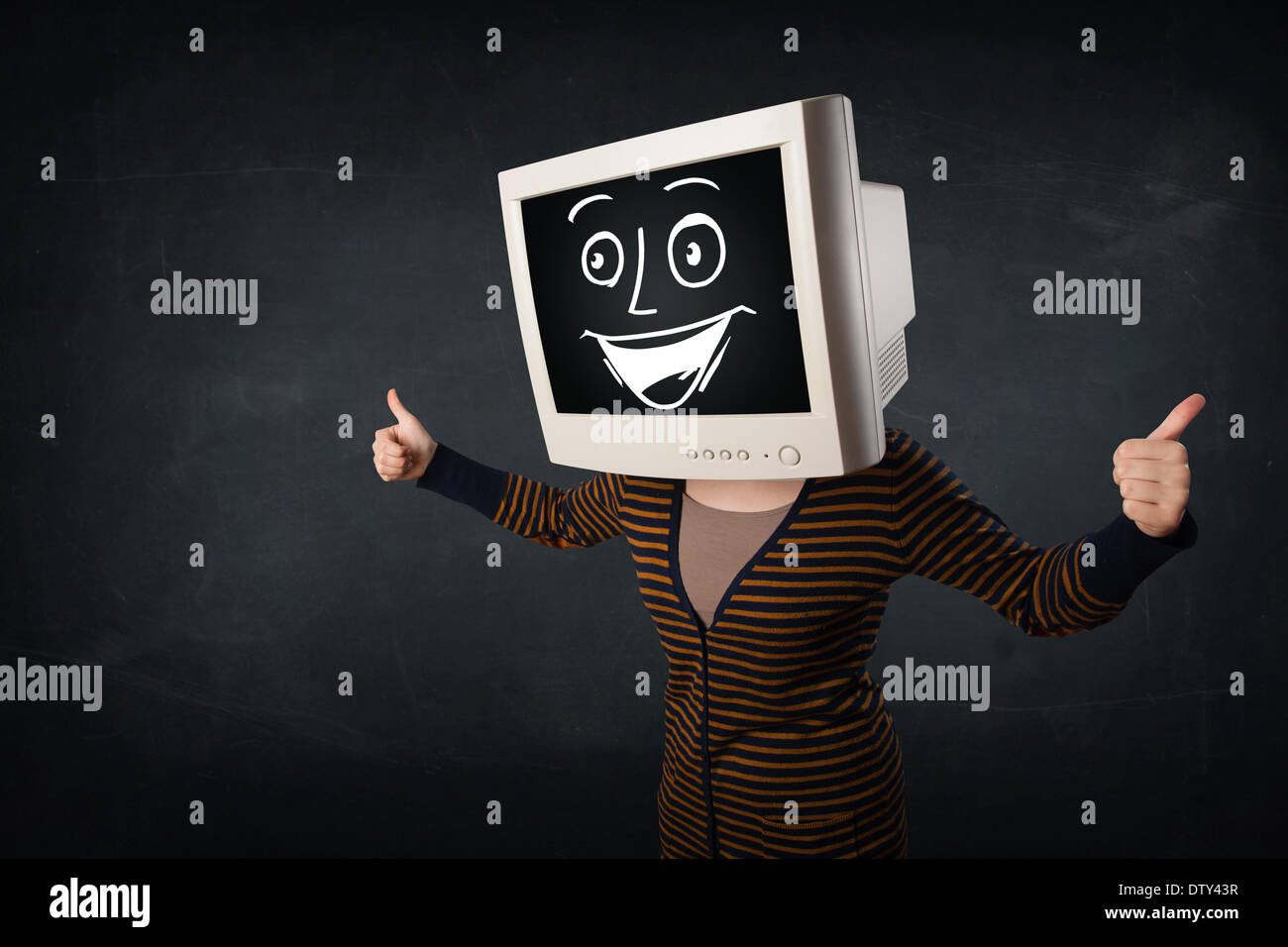 Girl with a monitor head and a cheerful cartoon face Stock Photo - Alamy