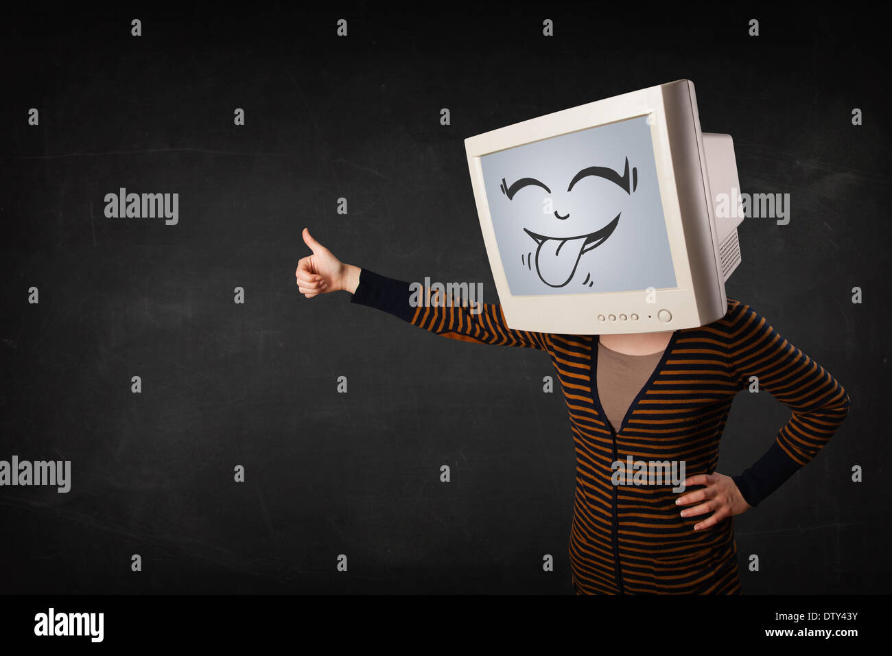Young girl wearing a monitor with a funny face Stock Photo - Alamy