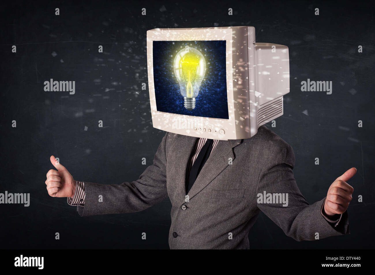 Business man with a pc monitor head and idea light bulb in the display ...