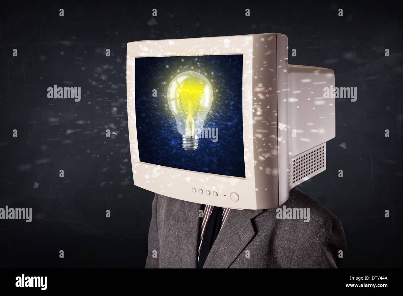 Business man with a pc monitor head and idea light bulb in the display ...