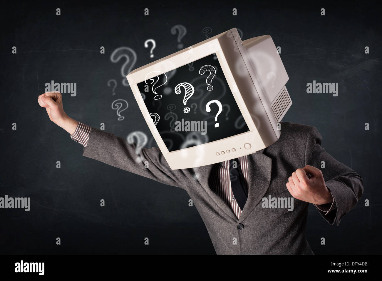 Businessman with a computer monitor head and question marks Stock Photo ...