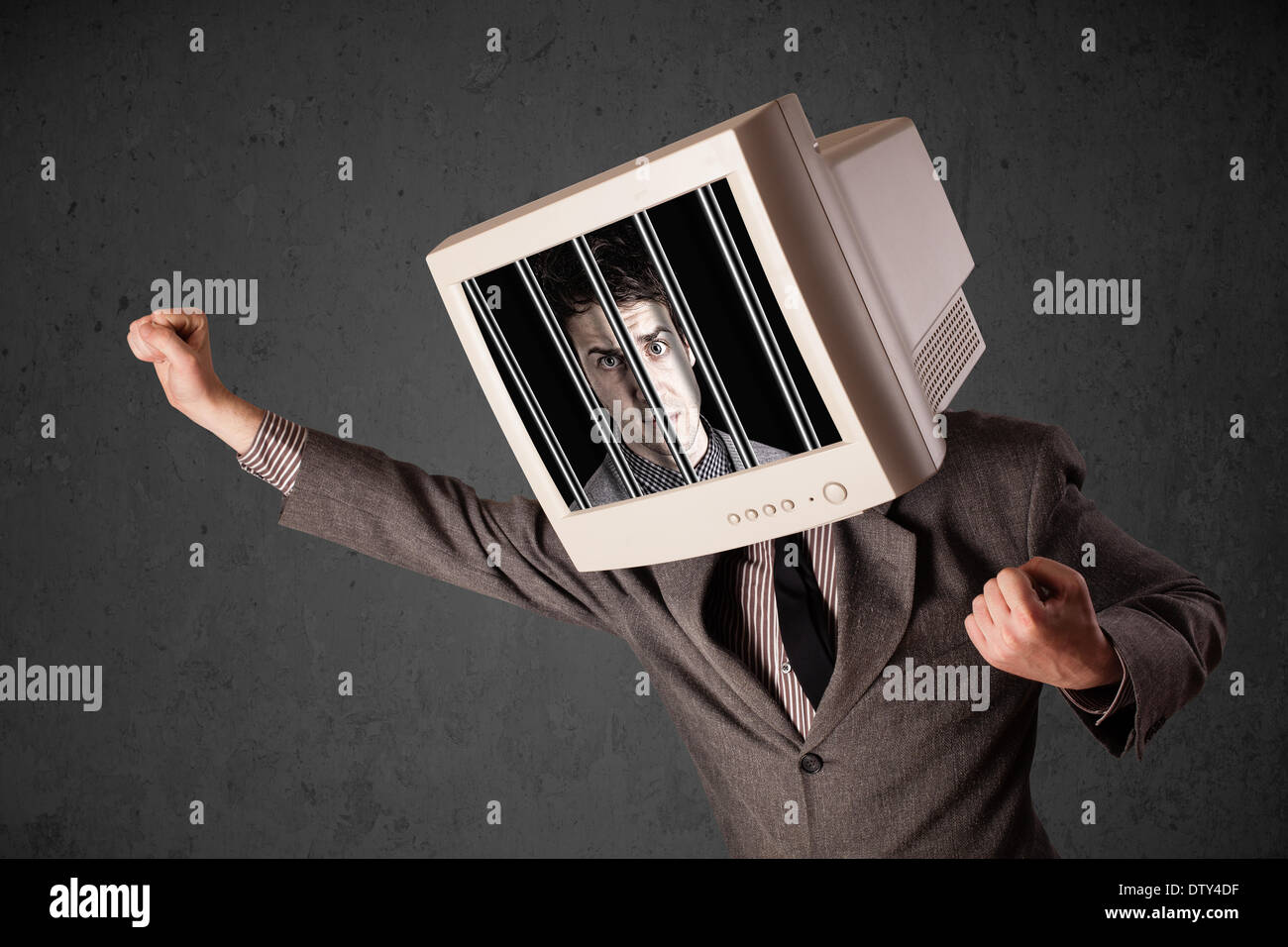 Business man with monitor on his head traped into a digital system ...