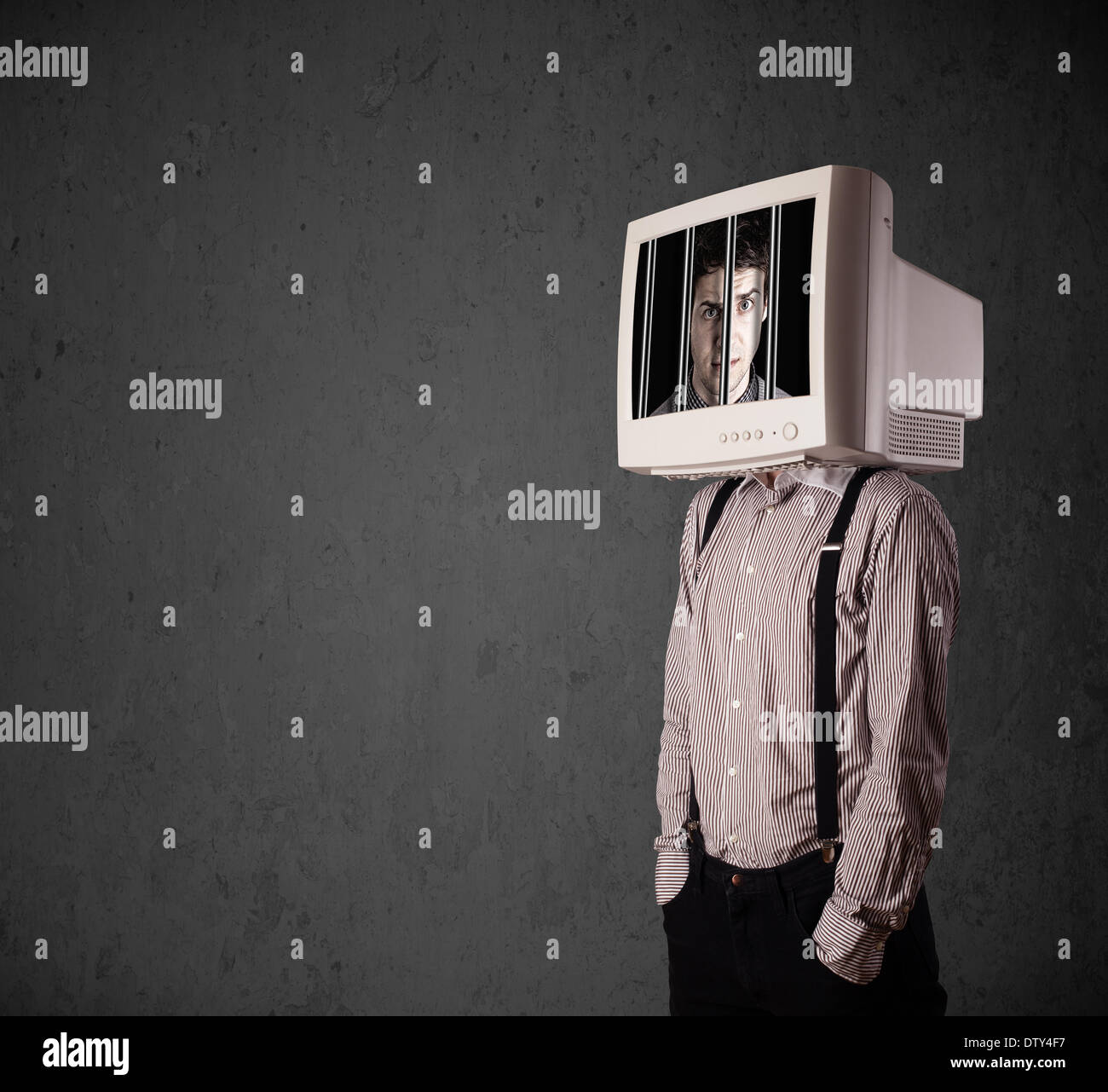 Business man with monitor on his head traped into a digital system ...