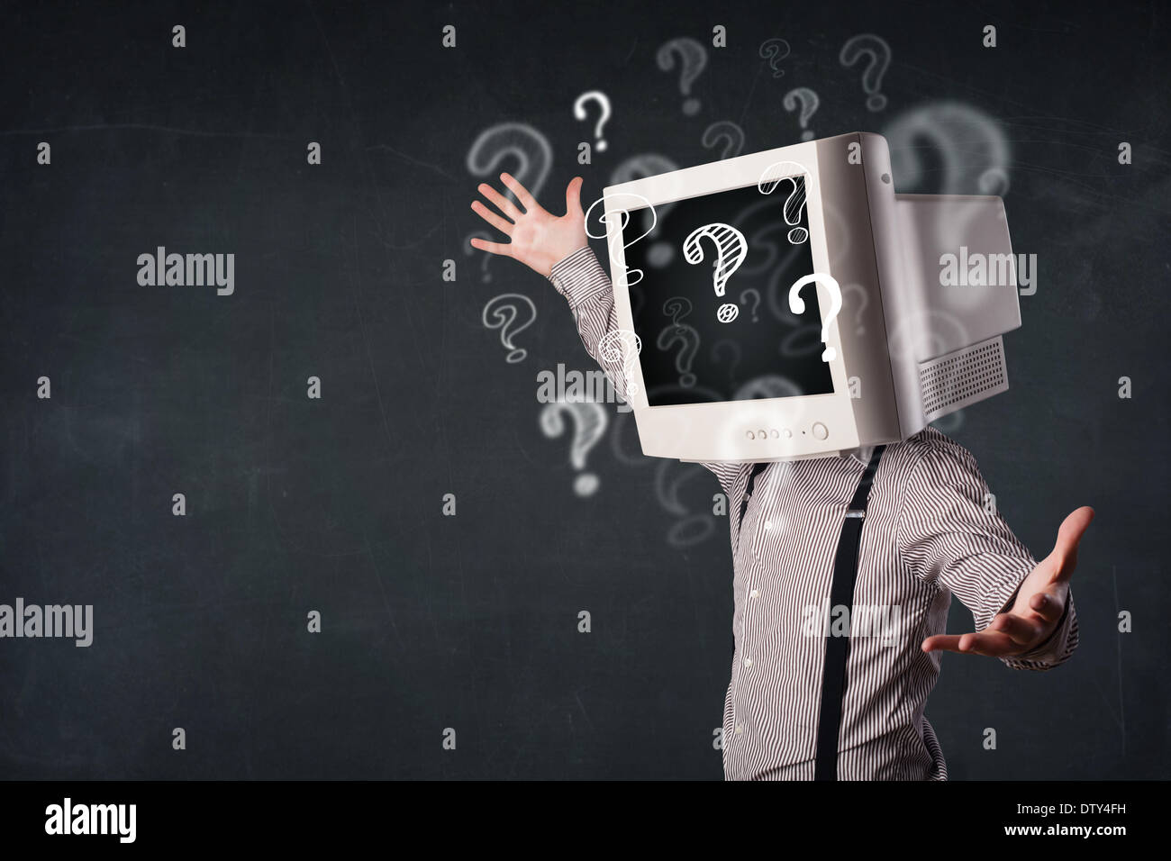 Businessman with a computer monitor head and question marks Stock Photo ...