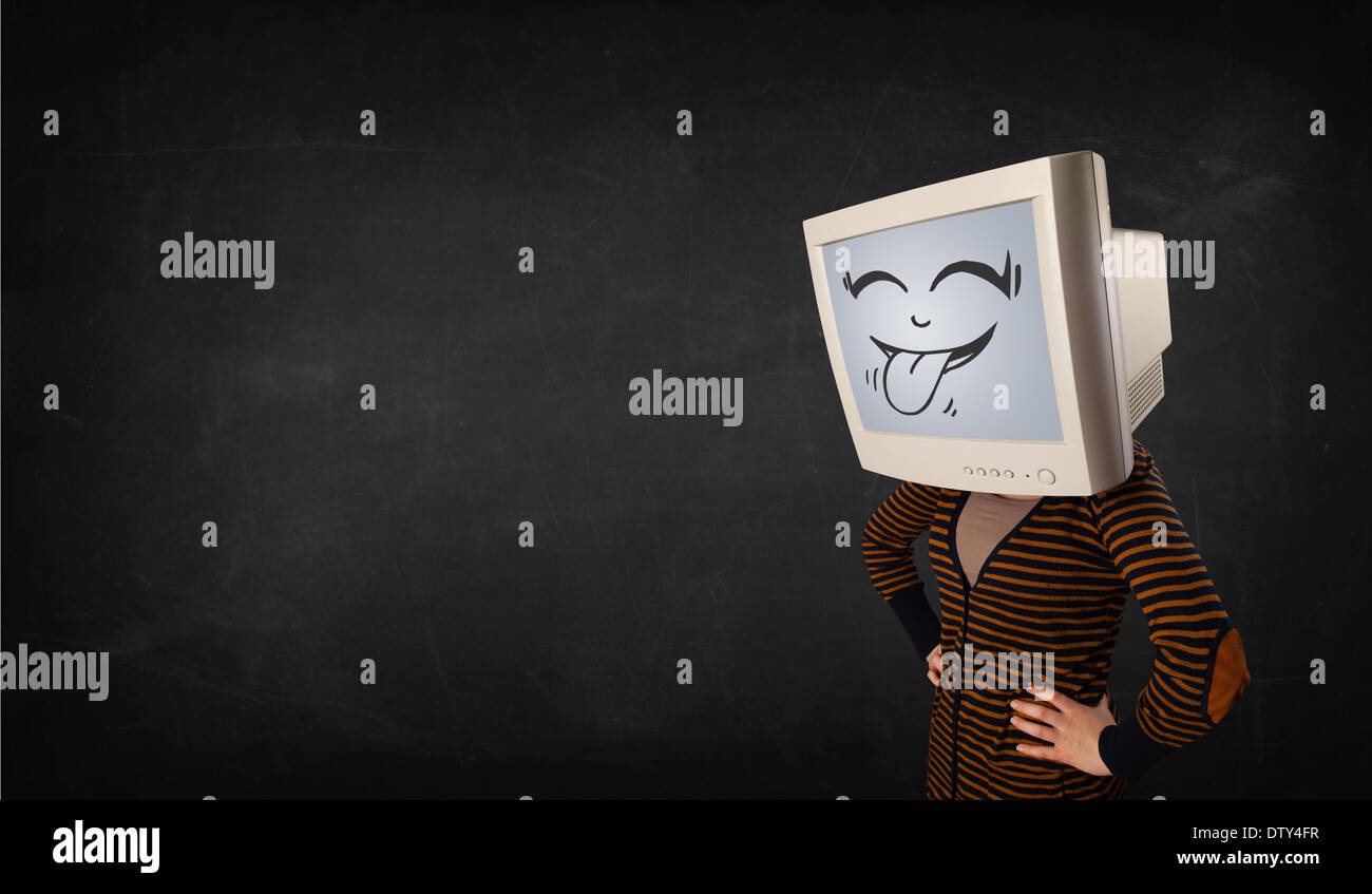 Young girl wearing a monitor with a funny face Stock Photo - Alamy