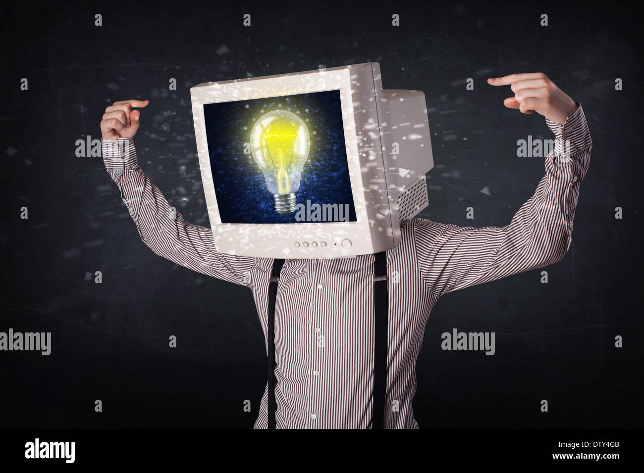 Business man with a pc monitor head and idea light bulb in the display ...