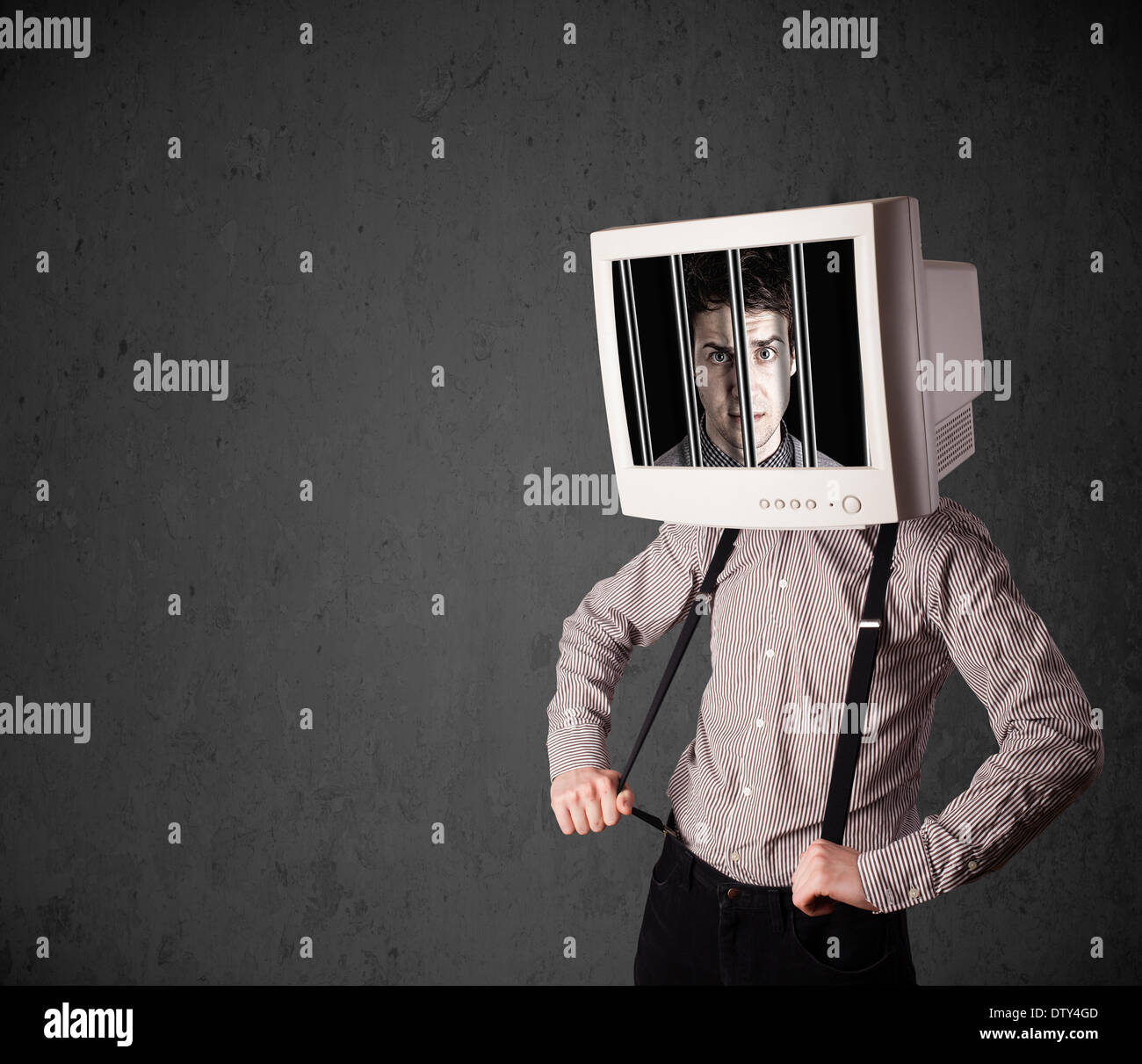 Business man with monitor on his head traped into a digital system ...