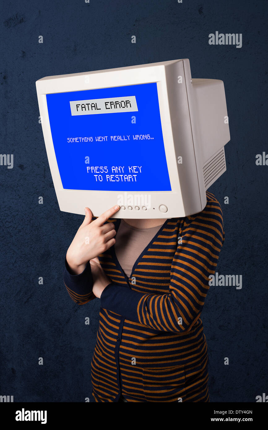 Person with a monitor head and fatal error blue screen on the display ...