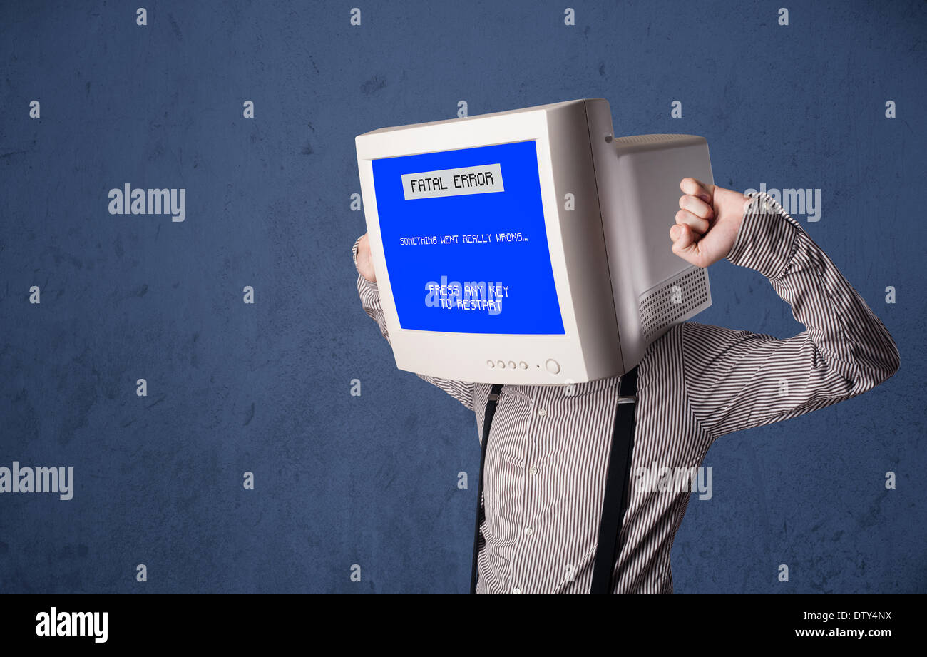 Person with a monitor head and fatal error blue screen on the display ...