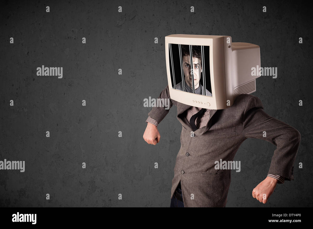 Business man with monitor on his head traped into a digital system ...