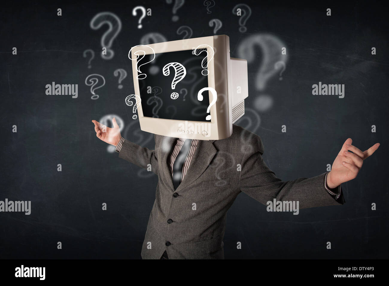 Businessman with a computer monitor head and question marks Stock Photo ...
